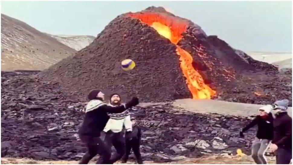 People Play Volleyball In Front of Erupting Volcano in Iceland Watch ...